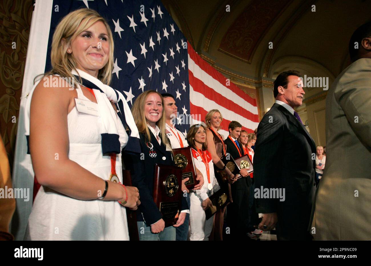 Erin Cafaro, left, and Mary Whipple, second from left, members of the ...