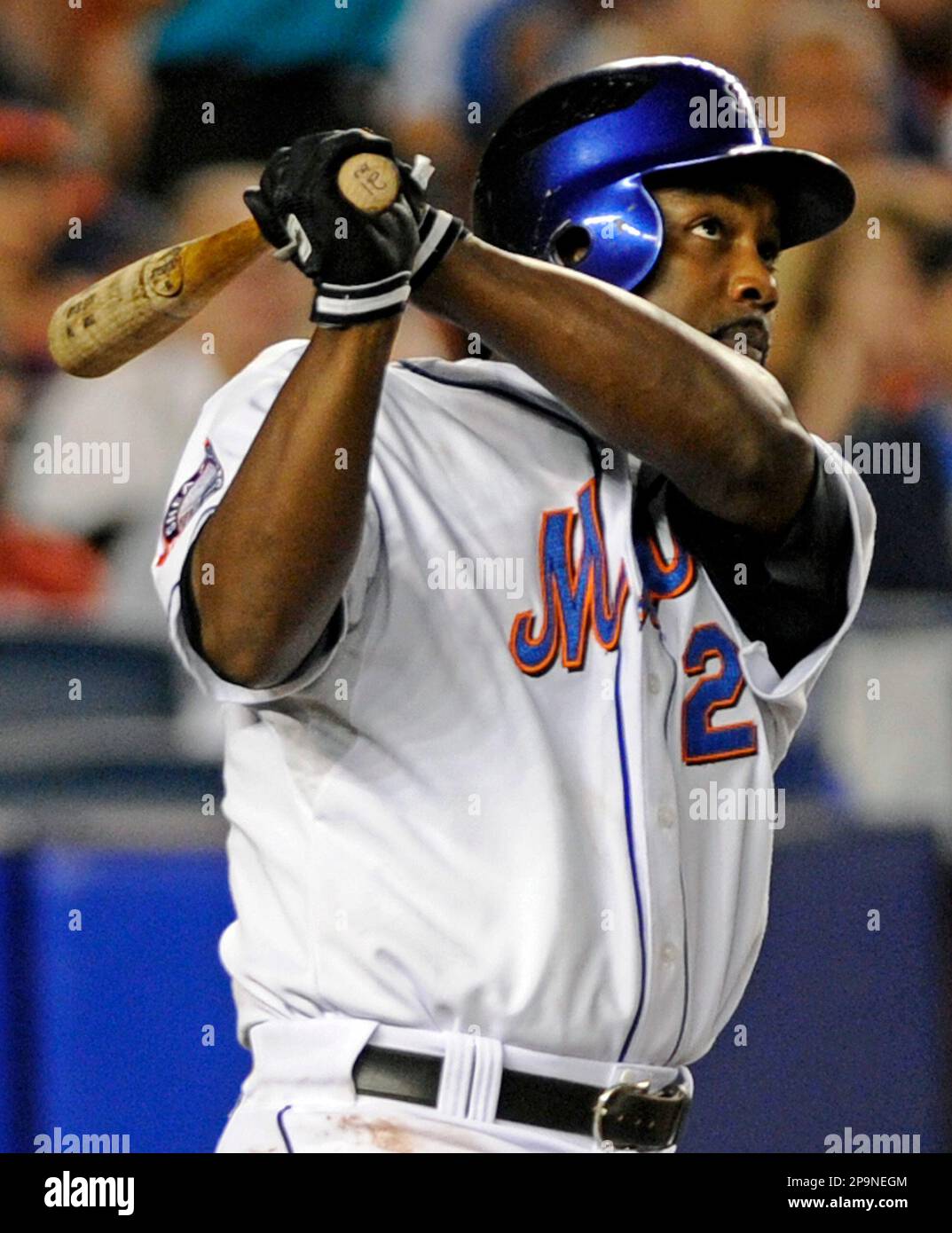 New York Mets' Carlos Delgado watches his home run in the fifth inning ...