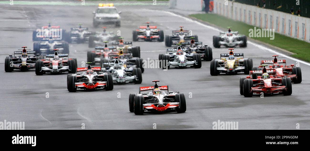 McLaren Mercedes Formula One driver Lewis Hamilton of Britain, foreground centre, leads in pole ...
