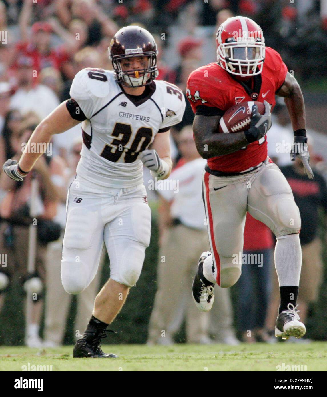 Georgia running back Knowshon Moreno, right, breaks away from Central ...