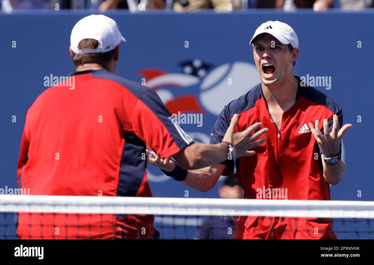 Bob Bryan, left, of the United States, celebrates with his brother Mike ...