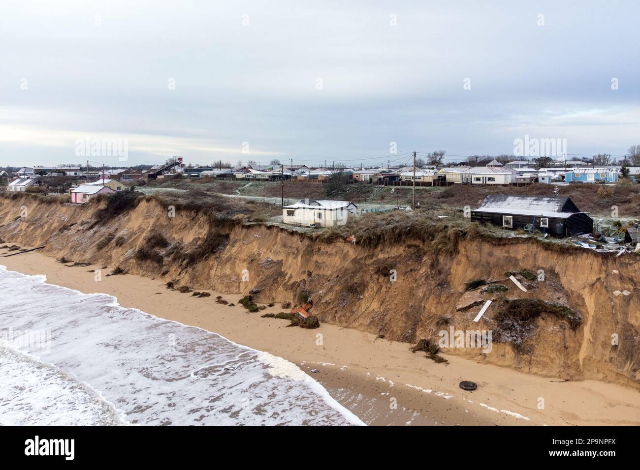 Houses close to the cliff edge at Hemsby in Norfolk, where a number of ...