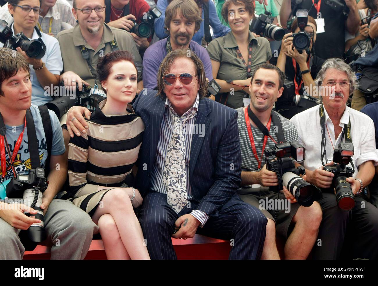 Actress Evan Rachel Wood and actor Mickey Rourke, third from right ...
