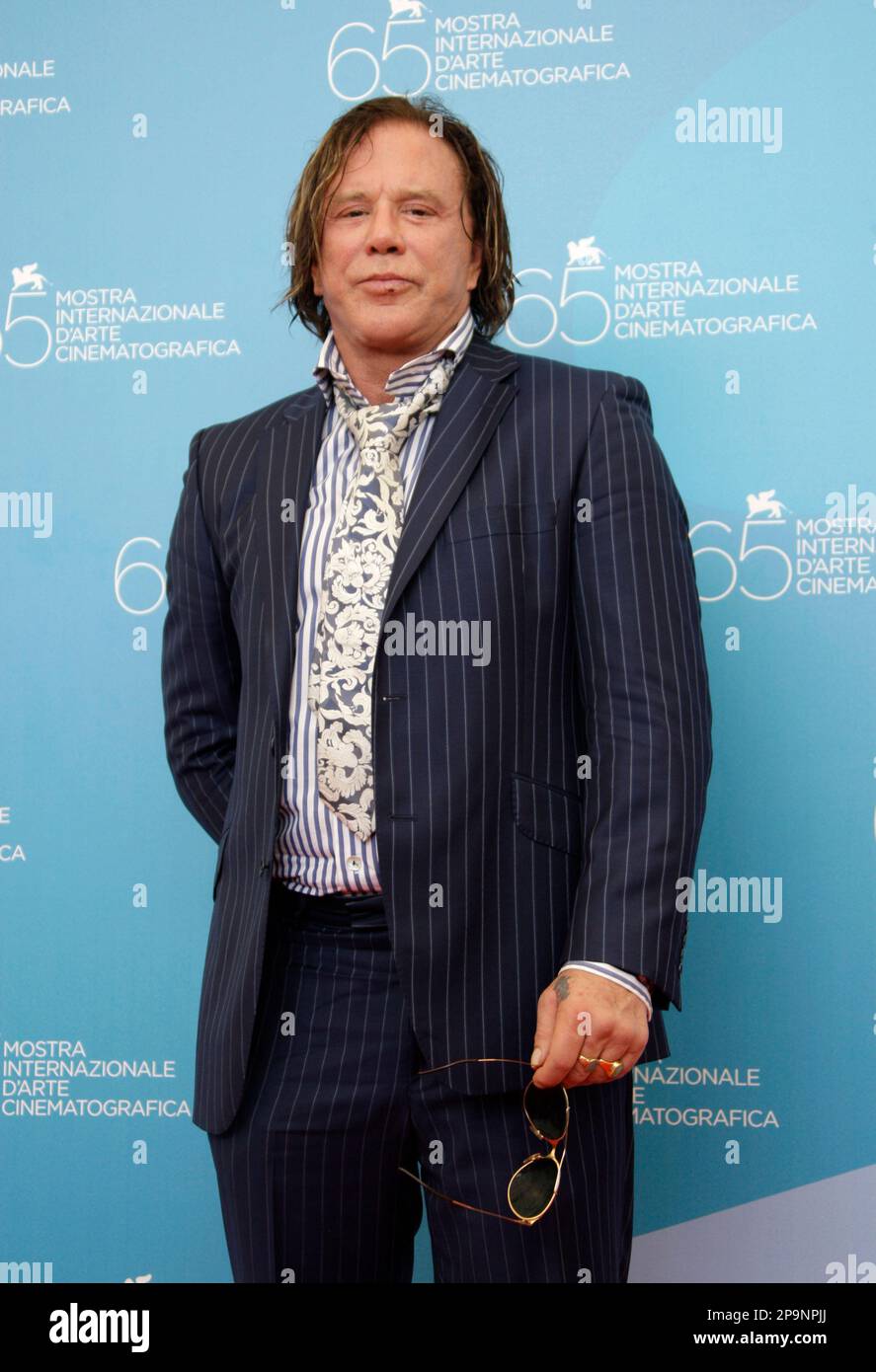 Actor Mickey Rourke poses for the photo call of the movie 'The Wrestler ...