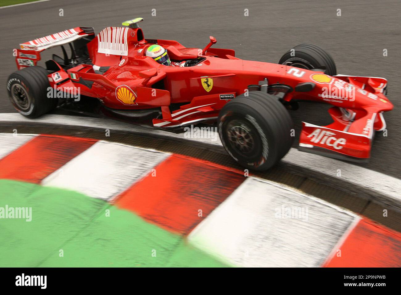 Ferrari Formula One driver Felipe Massa of Brazil steers his car into ...