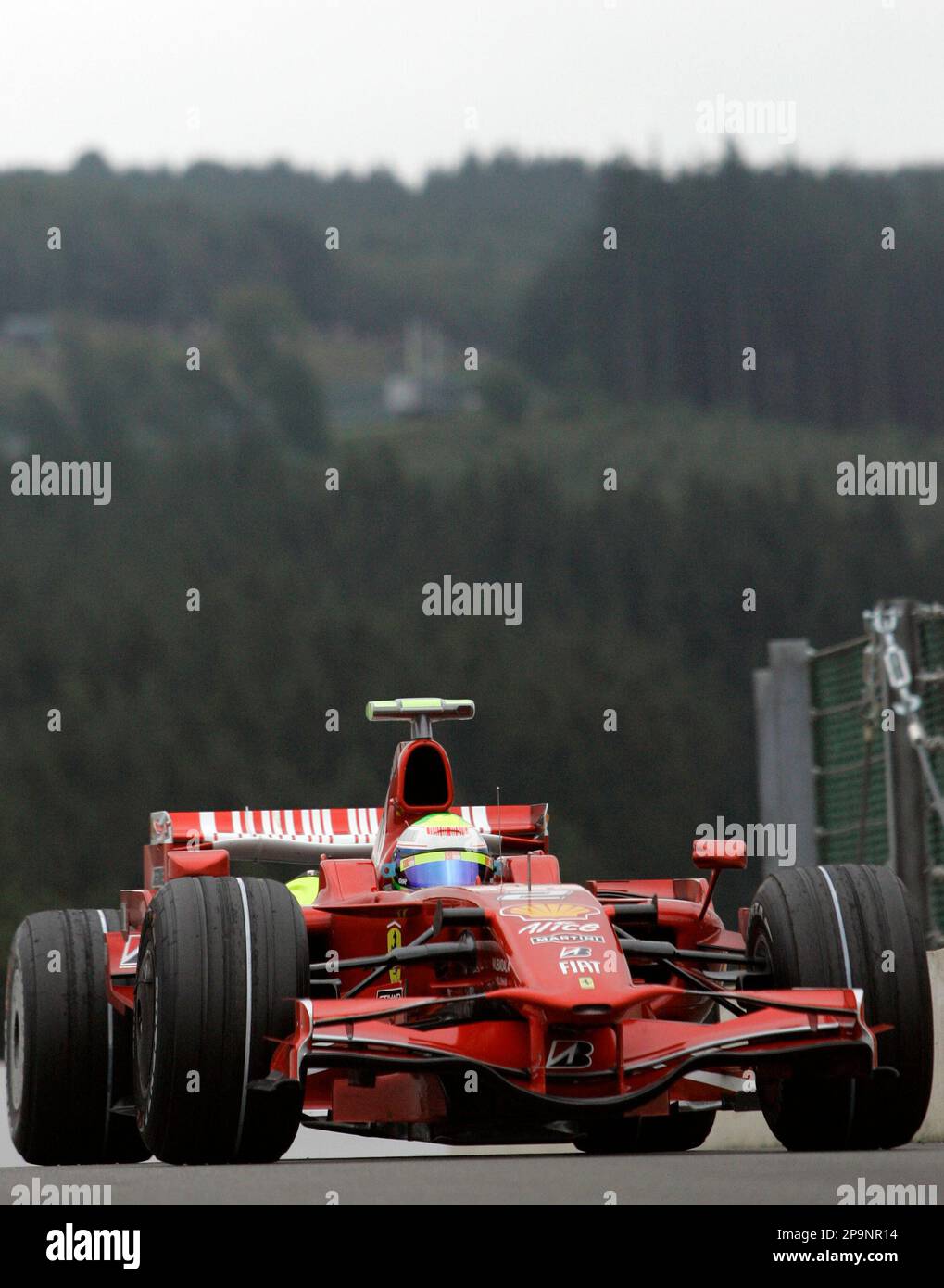 Ferrari Formula One driver Felipe Massa of Brazil enters the pitlane ...