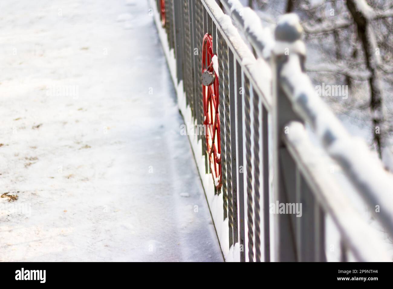 Metal railing of a pedestrian bridge on a winter day background Stock ...