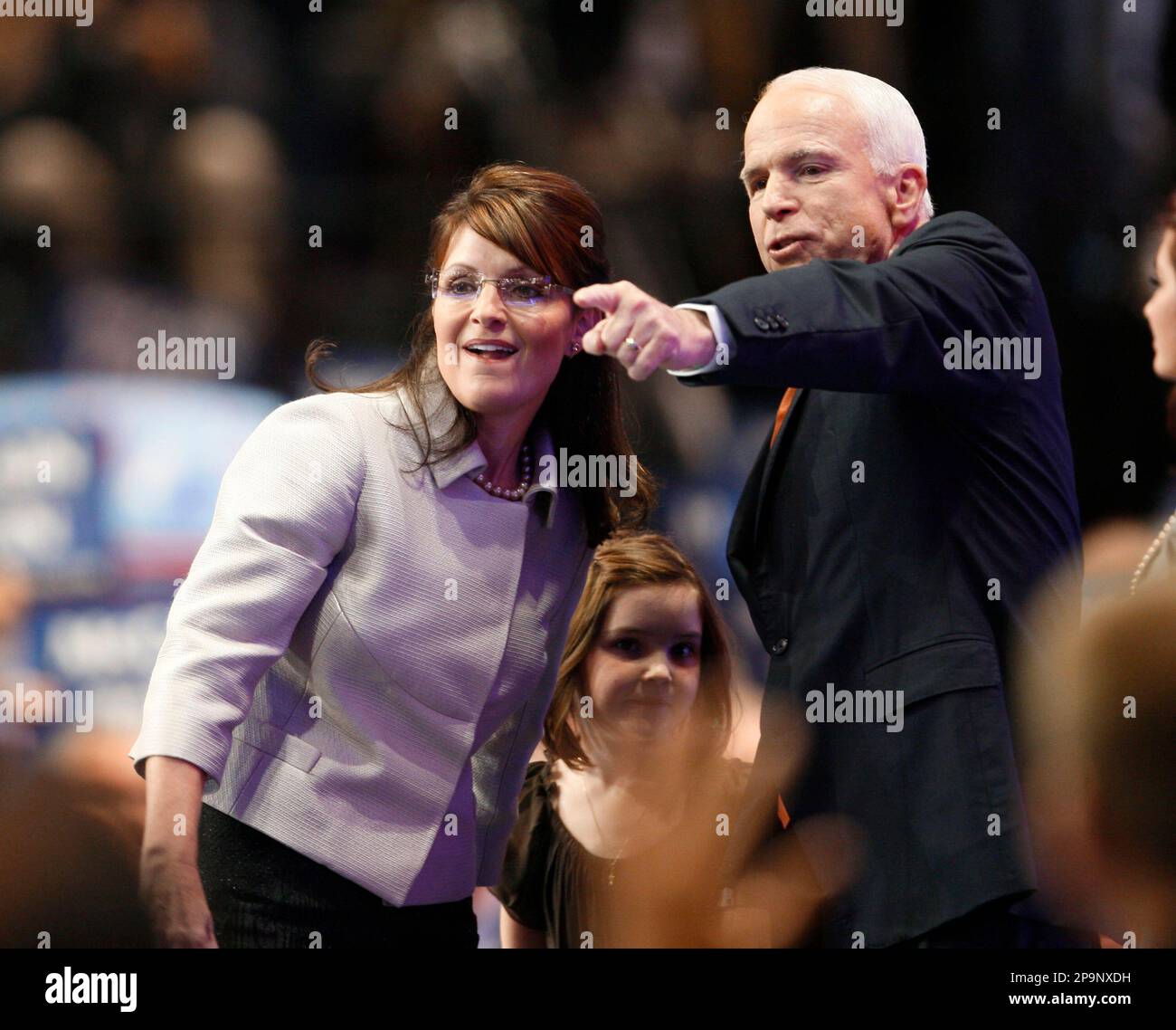 Republican vice presidential candidate Sarah Palin, left, is joined by ...