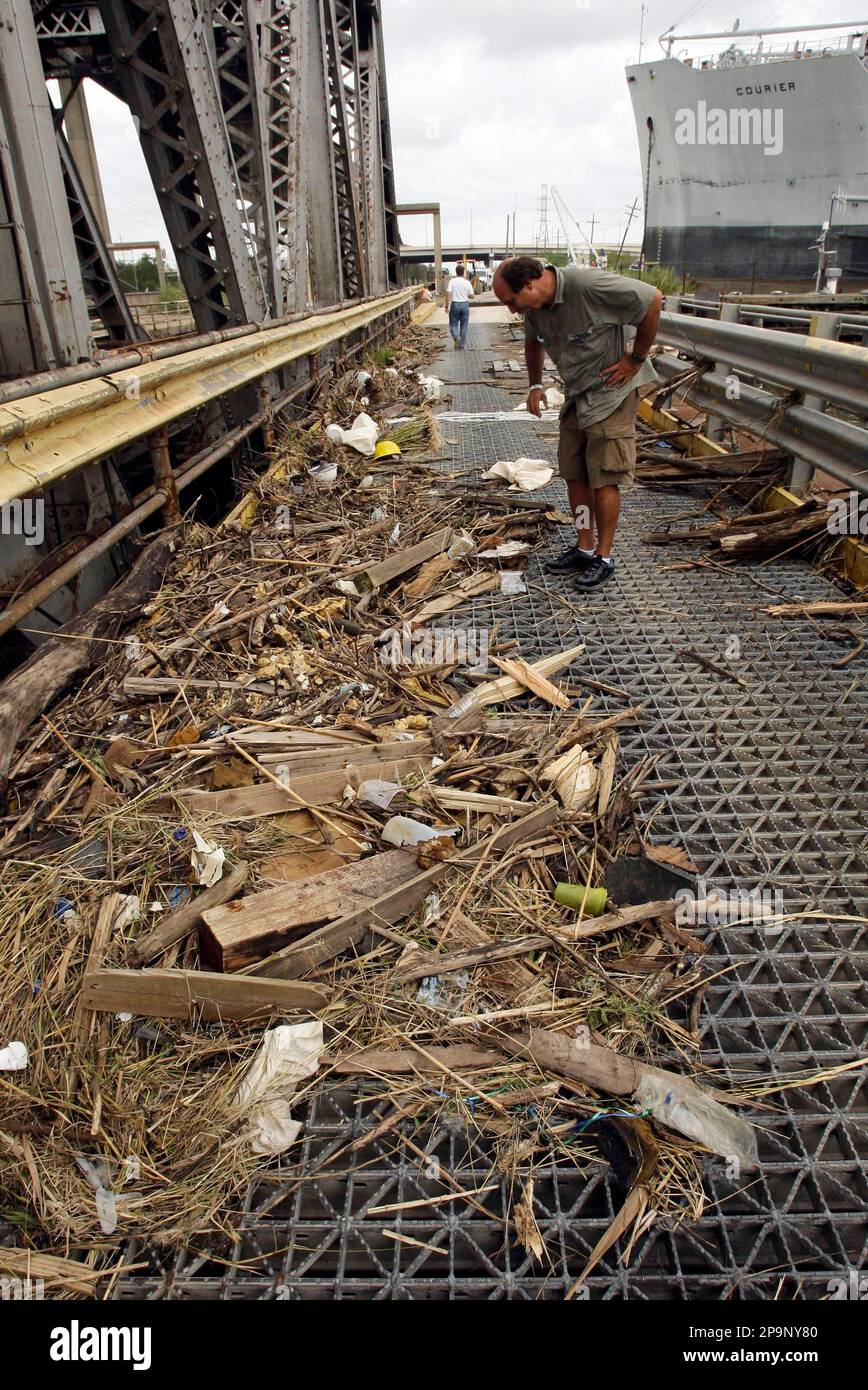 Coastal advocate Jimmy Delery inspects damage caused by Hurricane ...