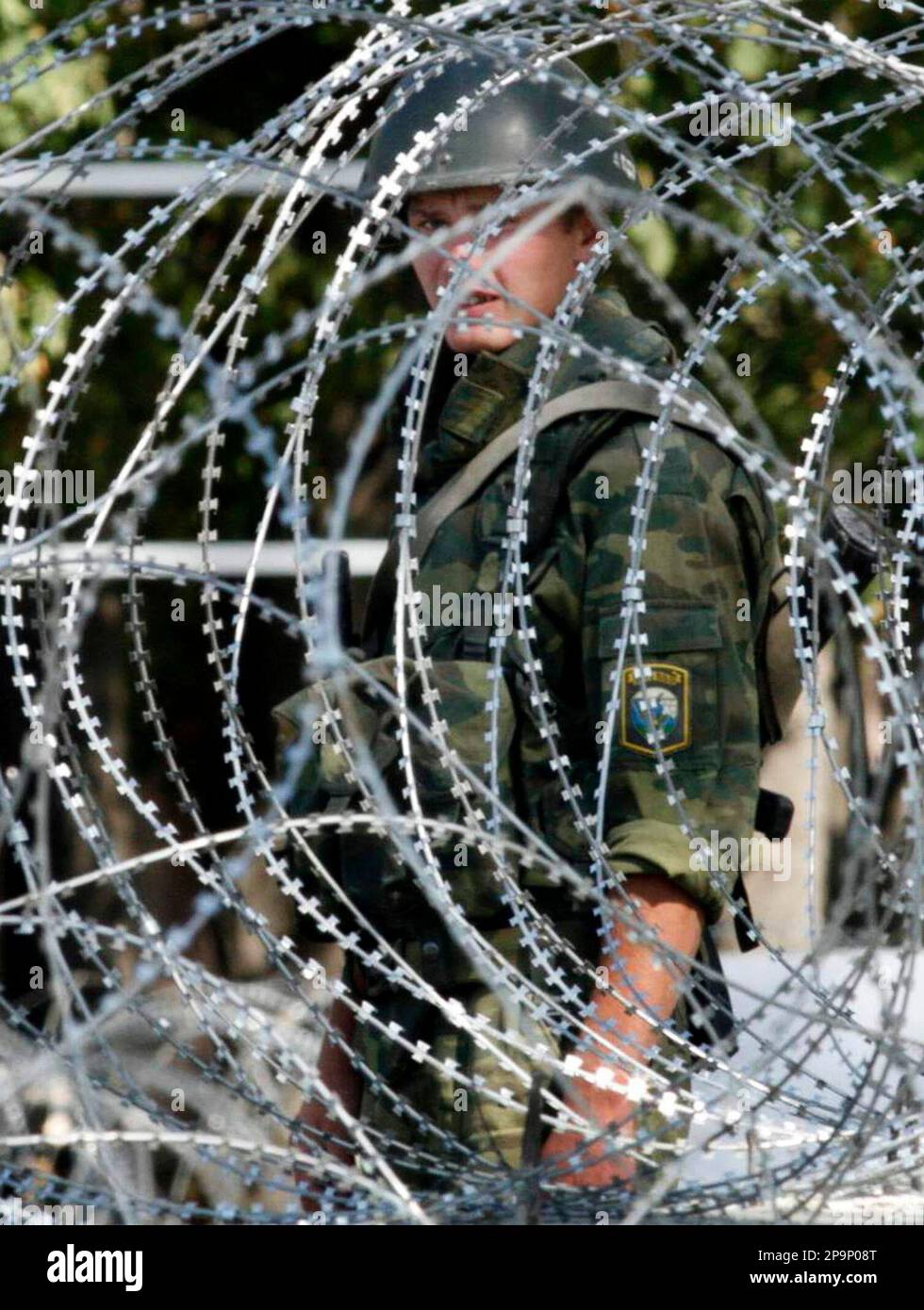 A Russian soldier at a Russian checkpoint at Karaleti, 7 km (4 miles ...