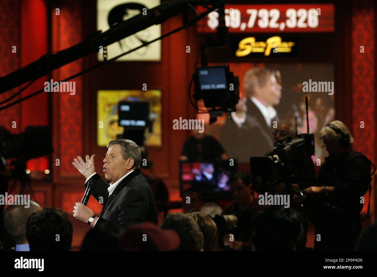 Jerry Lewis talks to the audience while broadcasting live during the ...