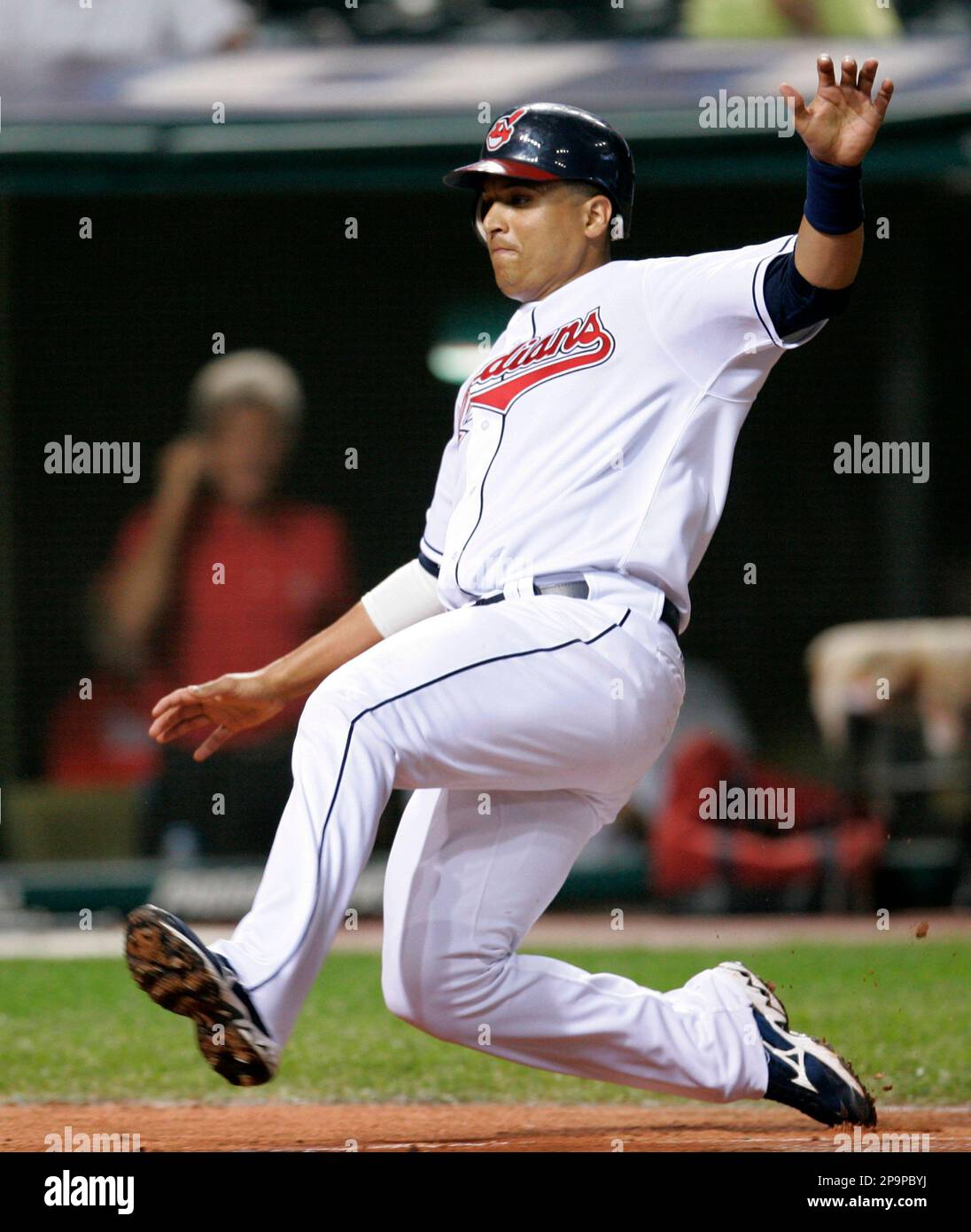 Cleveland Indians' Victor Martinez scores on a double by teammate Shin ...