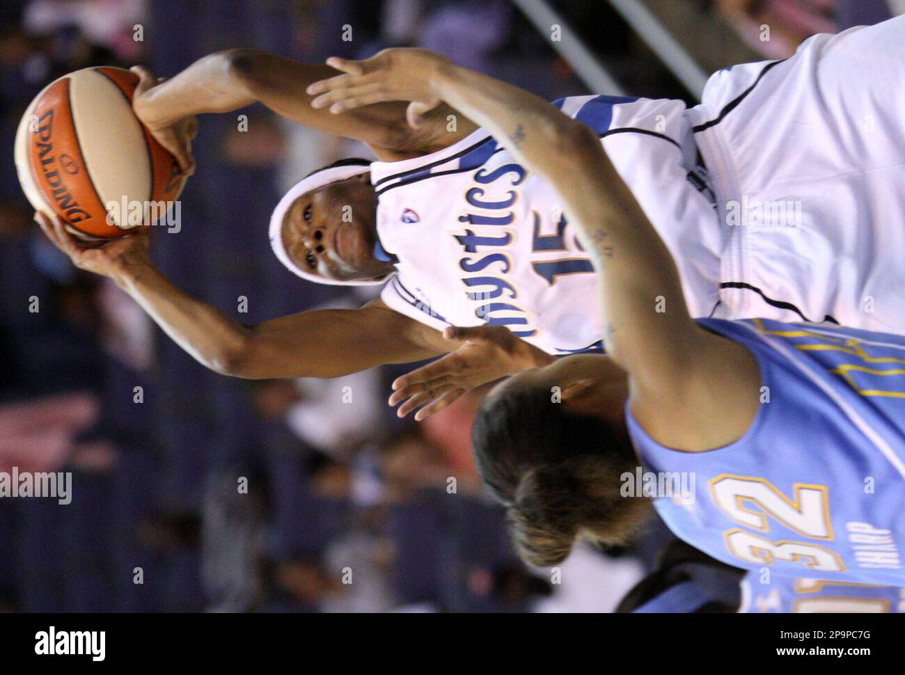Washington Mystics' Crystal Smith (15) shoots the ball over Chicago Sky ...