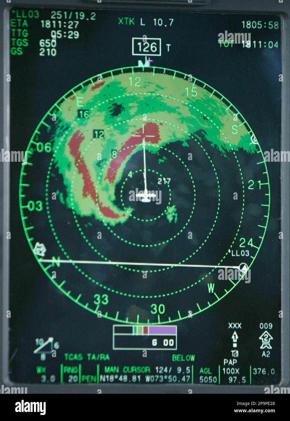 A radar screen aboard an Air Force Reserve C-130 Hurricane Hunter plane ...