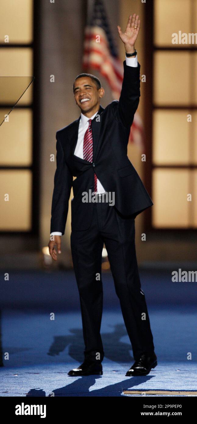 Democratic presidential nominee, Sen. Barack Obama, D-Ill., waves after ...