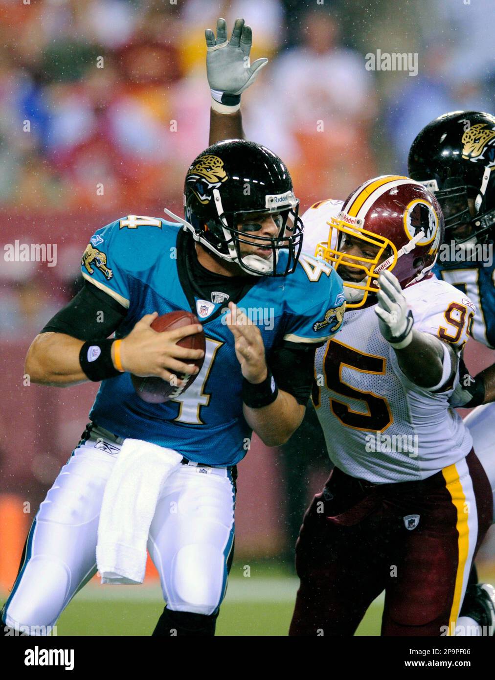Jacksonville Jaguars quarterback Todd Bouman (4) is sacked by ...