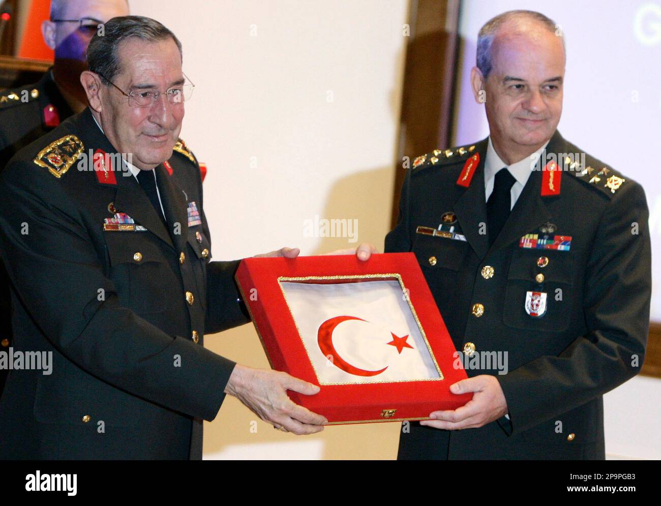 Turkey's former Chief of Staff Gen. Yasar Buyukanit, left, and his ...