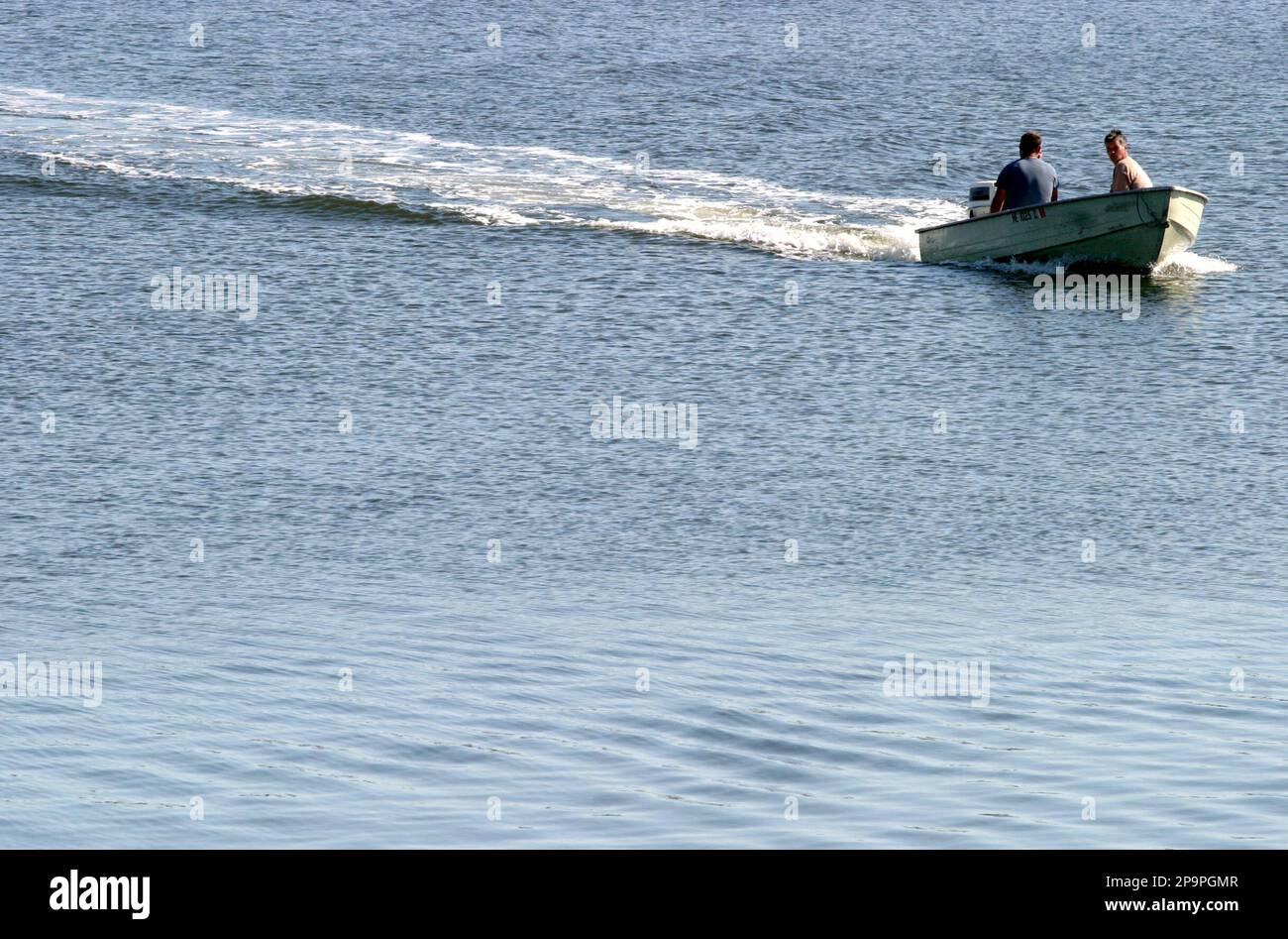 Worm diggers make their way back to the town landing in Wiscasset ...