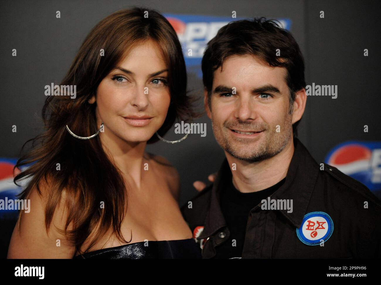 NASCAR driver Jeff Gordon and his wife Ingrid arrive for the Pepsi 500 ...