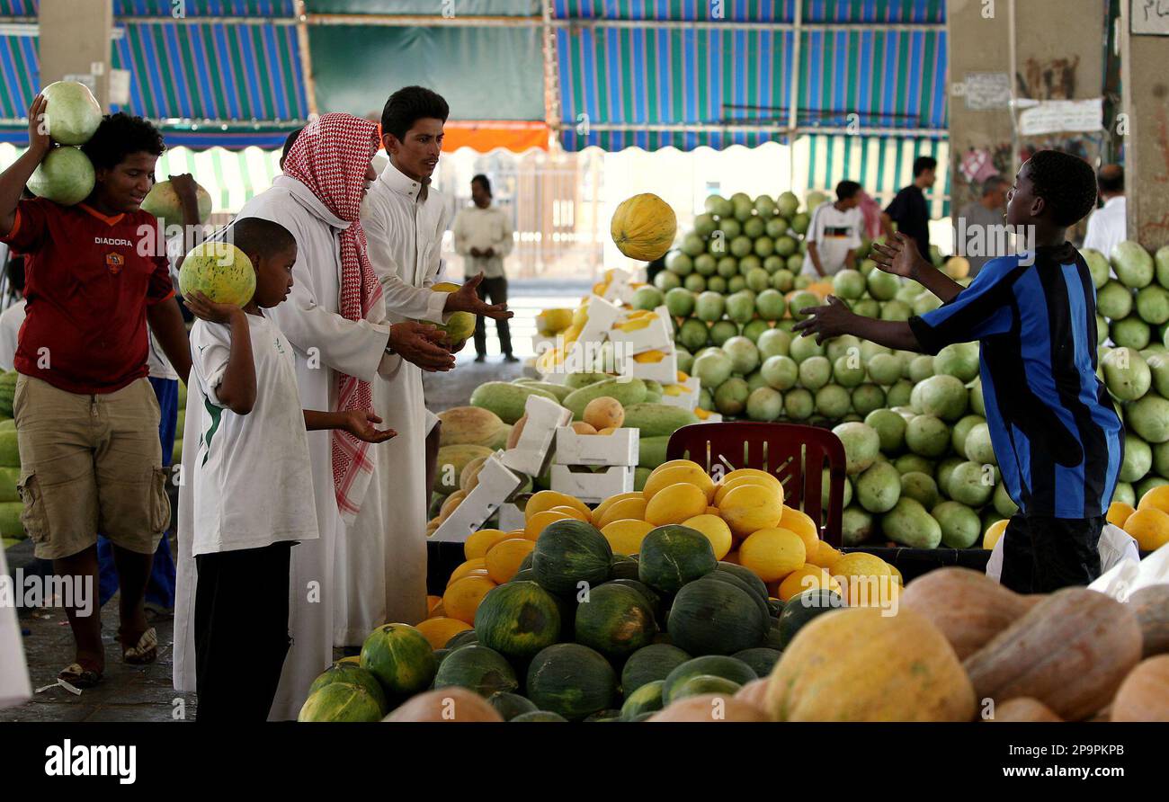 A Saudi vendor sells watermelon at Otaiga market in Riyadh, Saudi ...