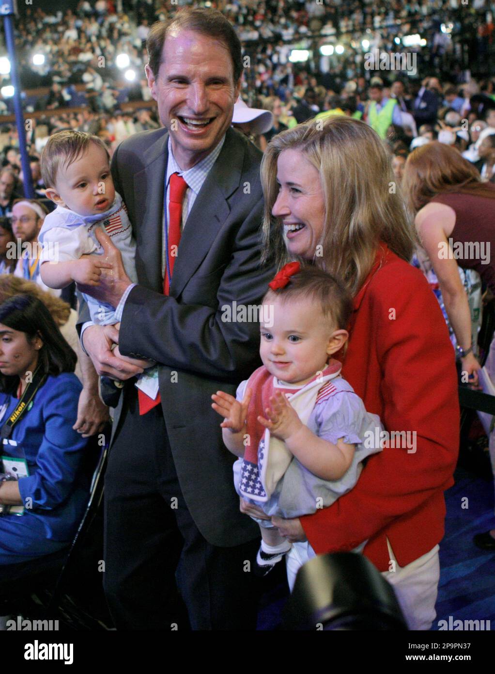 Sen. Ron Wyden, D-Ore., walks with his wife Nancy and twins William ...