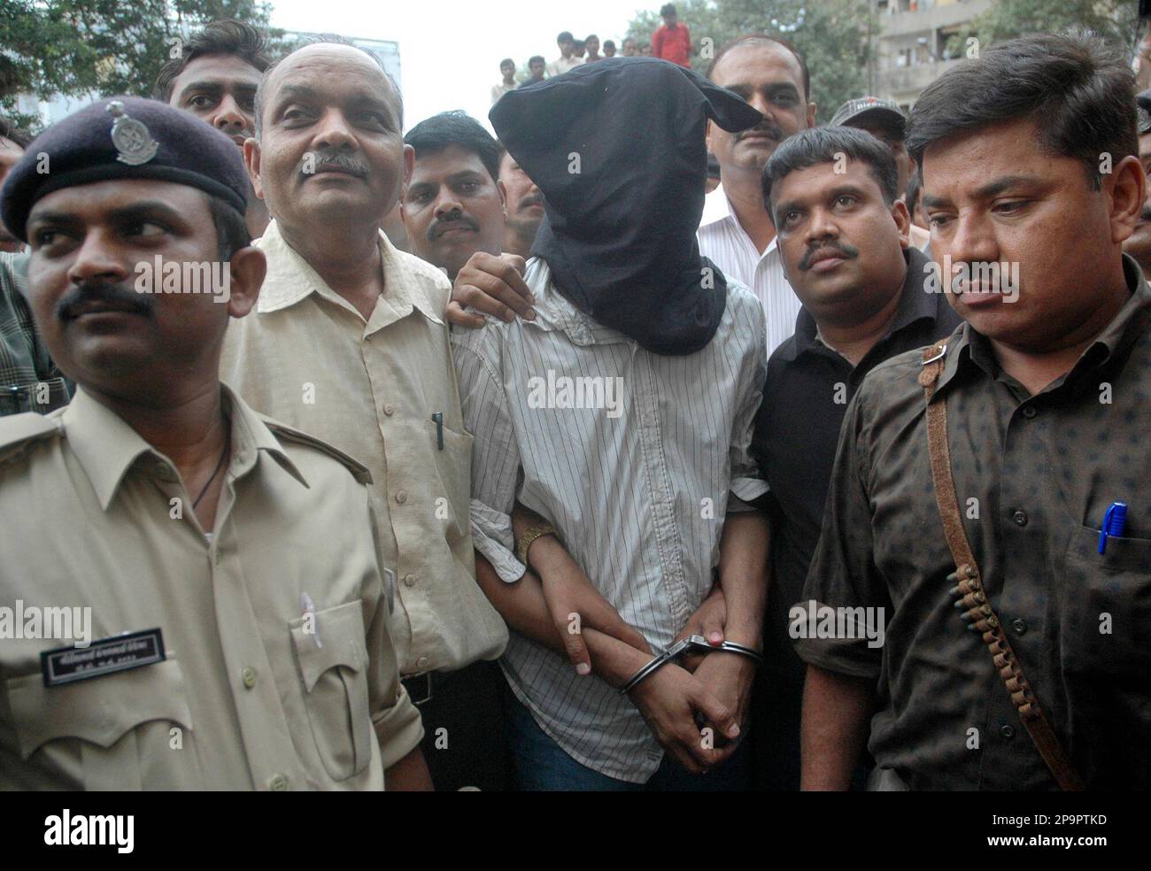 Students Islamic Movement of India (SIMI) chief Safdar Nagori, center ...
