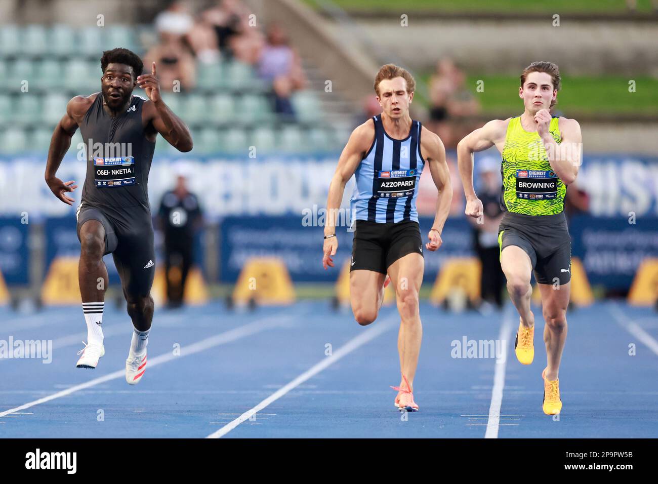 Rohan Browning of Australia (R), wins the Men 100 metresduring the 2023 ...