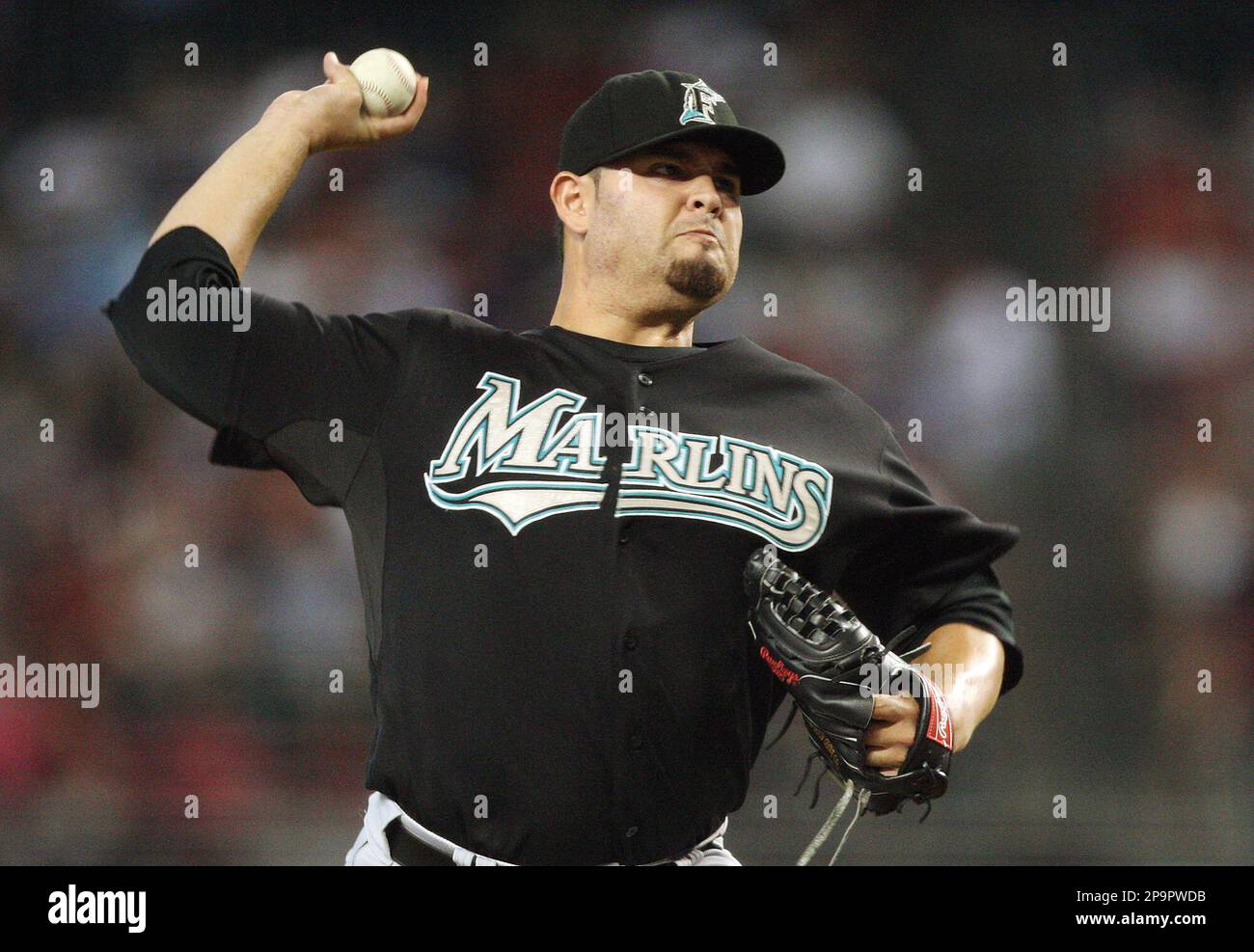 Florida Marlins' Ricky Nolasco throws against the Arizona Diamondbacks ...