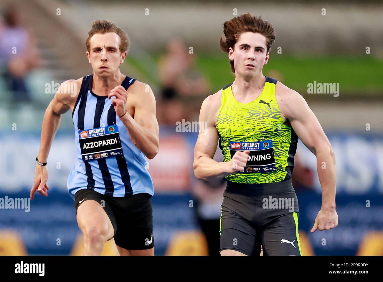 Rohan Browning of Australia (R), wins the Men 100 metresduring the 2023 ...