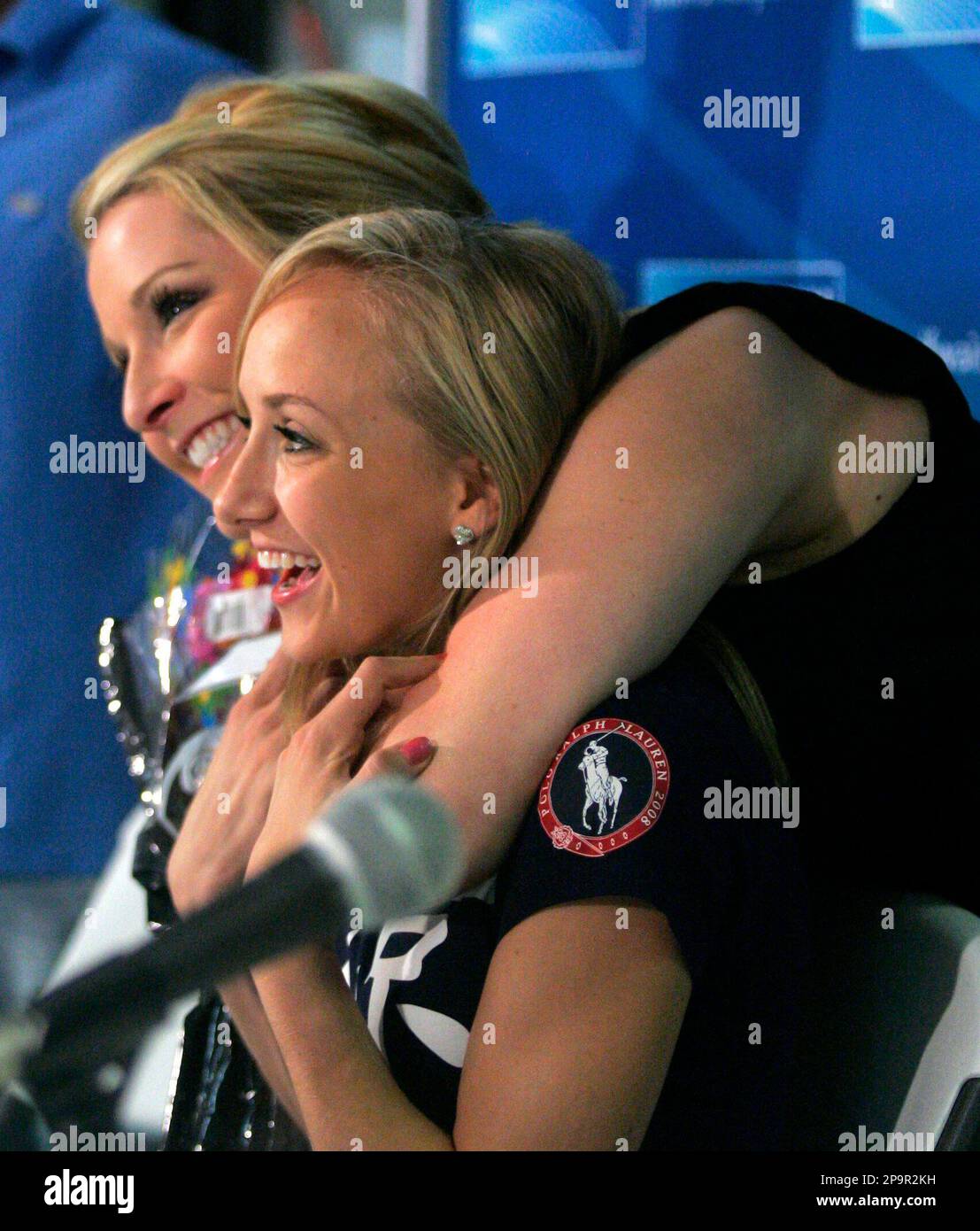 Gymnast Nastia Liukin, front, is greeted by fellow Olympic champion ...