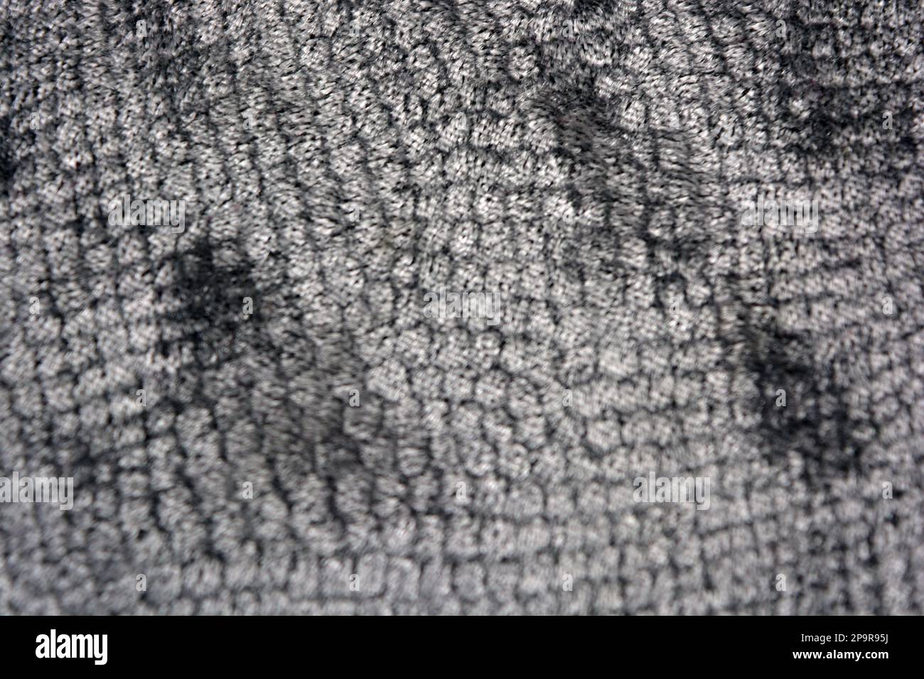Gray fluffy velvet fabric with an interesting and intriguing pattern in ...