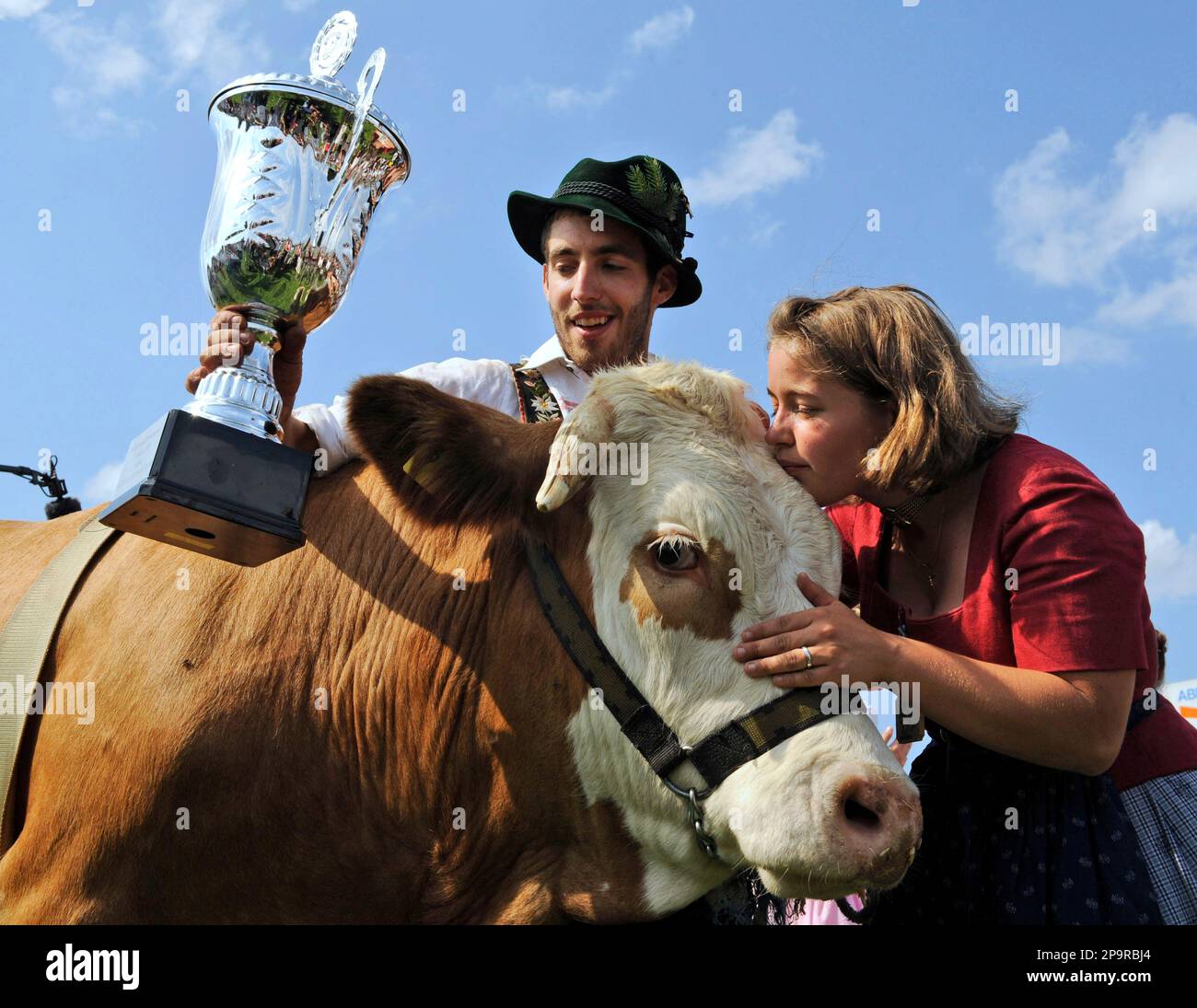 Martin Breiter, left, and Christine Breiter, right, celebrates beside ...