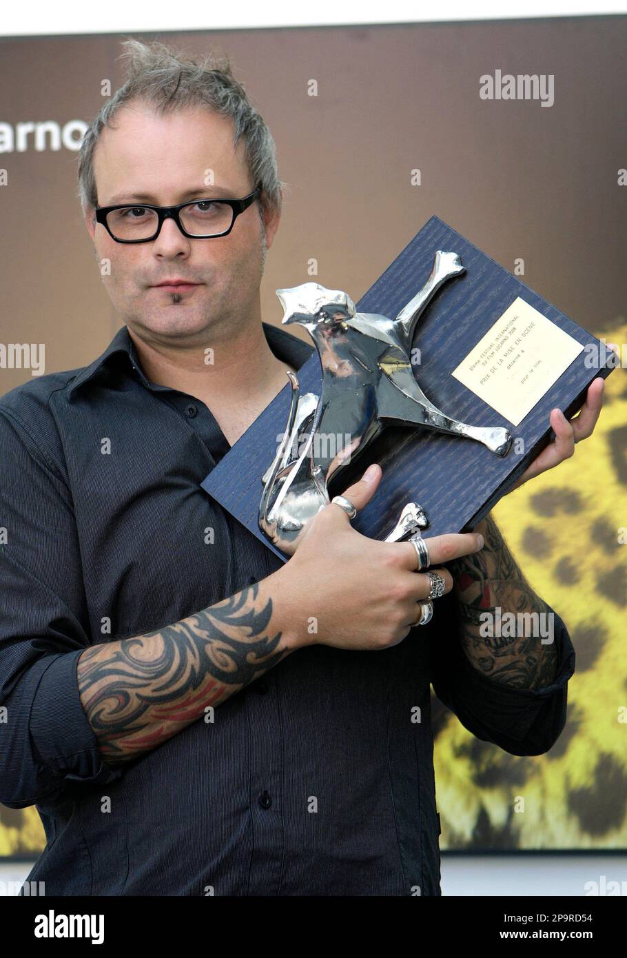 Canadian director Denis Cote poses with the Leopard for the best ...