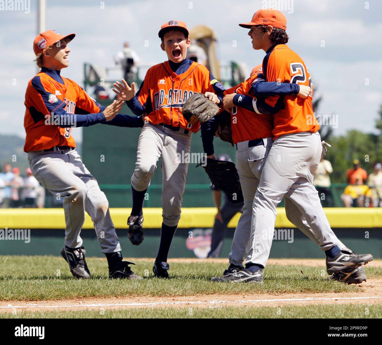 Teammates from the Mid-Atlantic team from Hagerstown, Md., from left ...