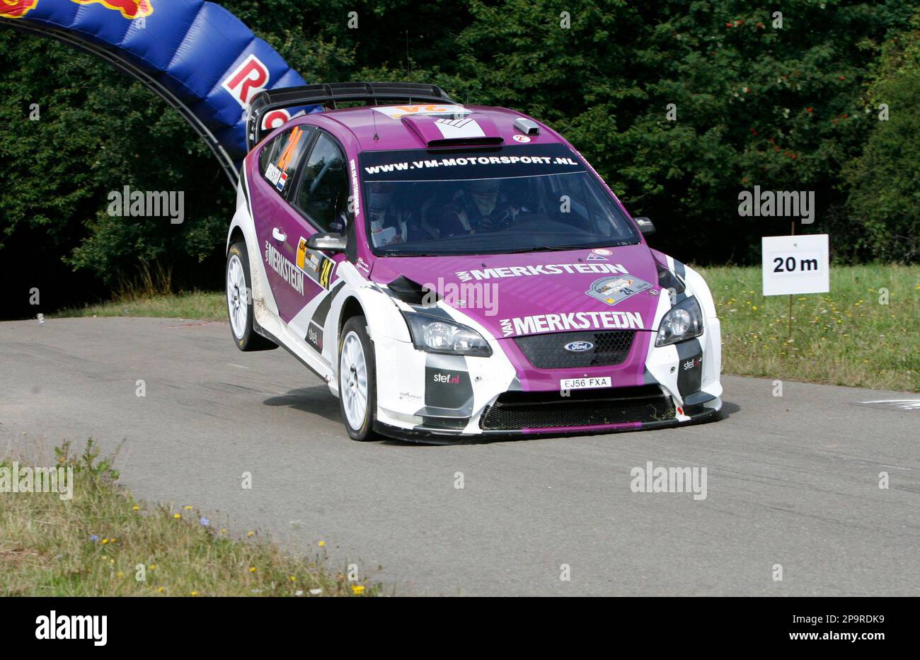 Dutch Peter van Merksteijn jumps with his Ford Focus WRC in the special ...