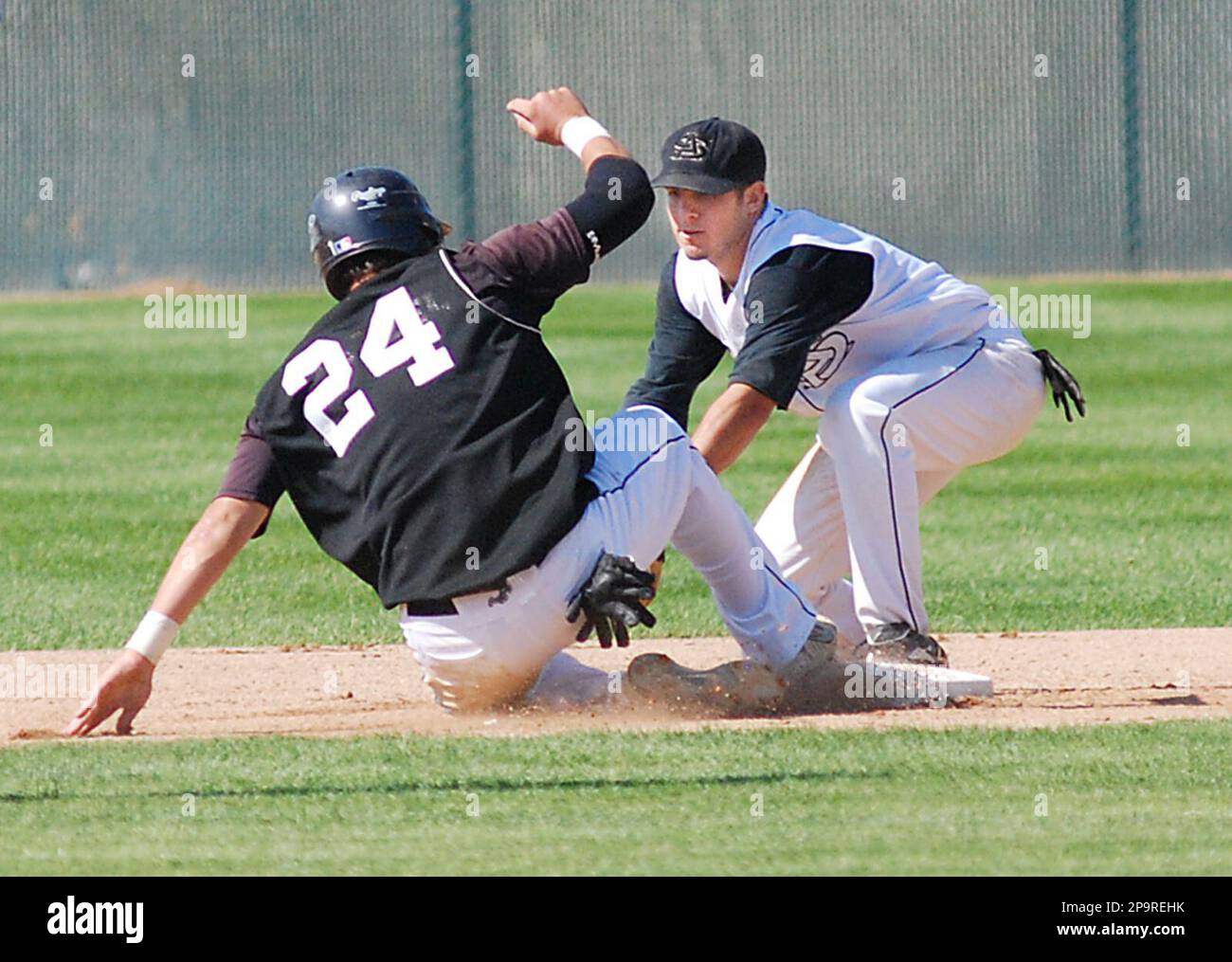 Dickinson's Cole Frenzel slides into second base ahead of the tag by ...