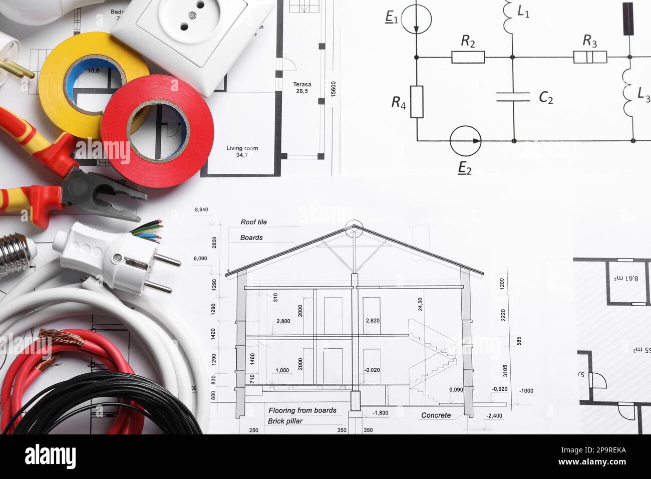 Set of electrician's tools and accessories on house plan, flat lay ...
