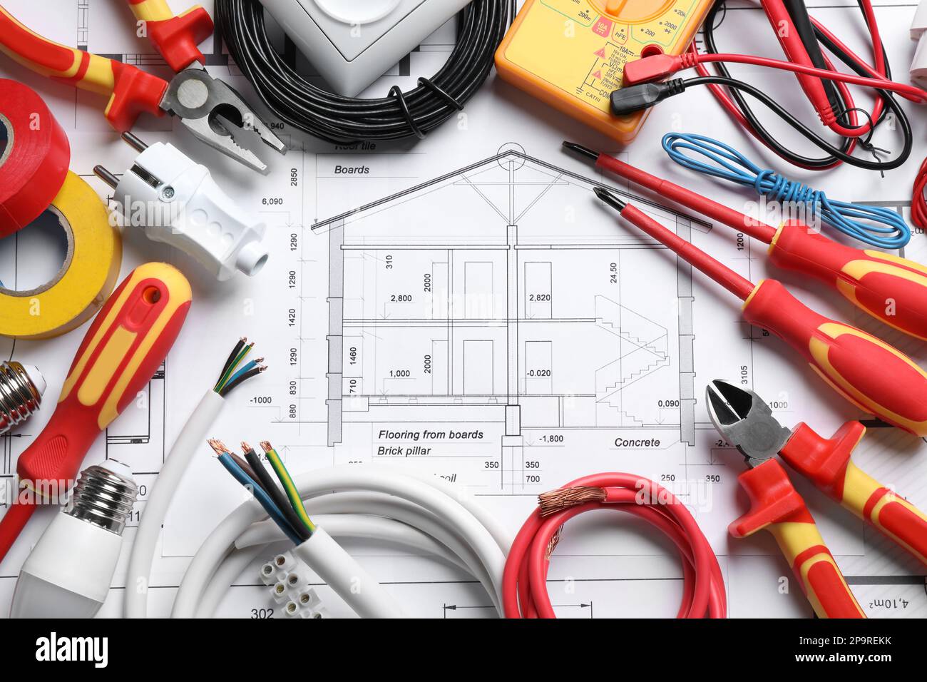 Set of electrician's tools and accessories on house plan, flat lay ...