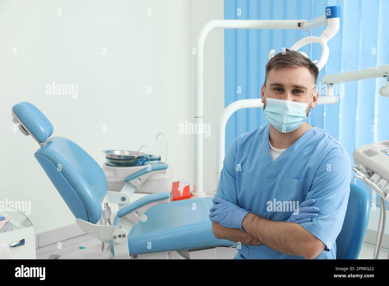 Portrait of professional dentist at workplace in clinic Stock Photo - Alamy