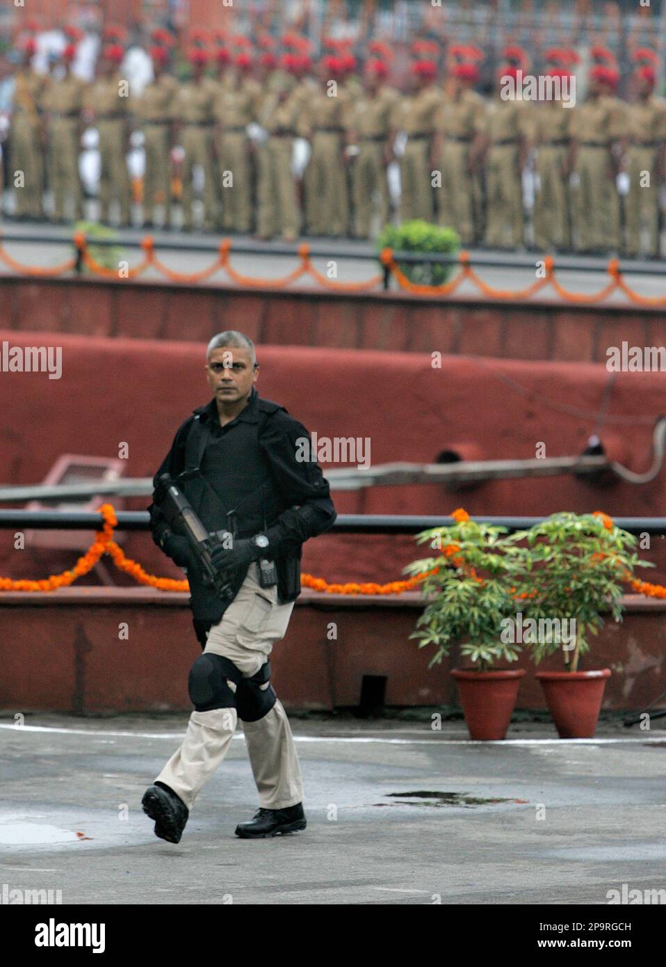 A commando keeps vigil at the Red Fort monument premises where the ...