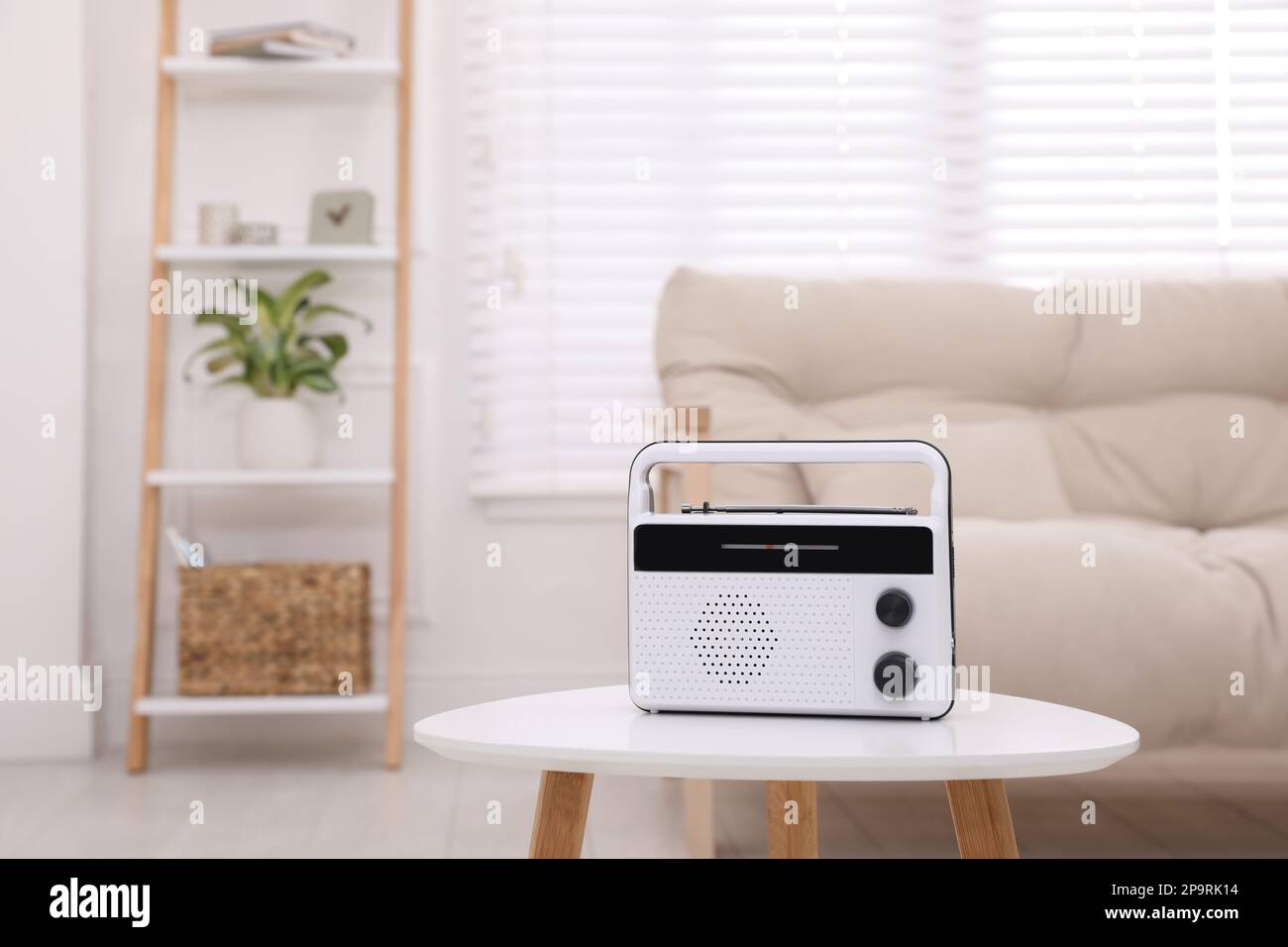 Stylish white radio on table indoors. Space for text Stock Photo - Alamy