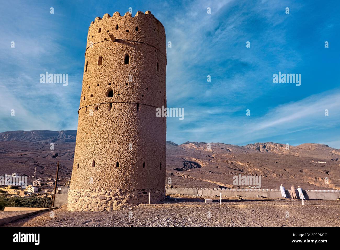 Tower ruin overlooking the old village of Al Hamra, Oman Stock Photo ...