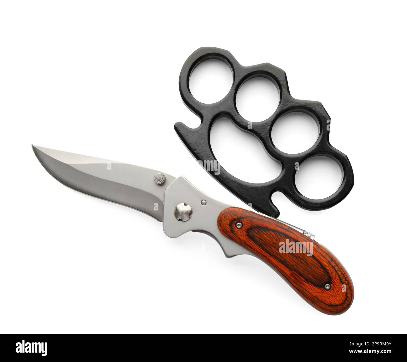 Black brass knuckles and knife on white background, top view Stock ...