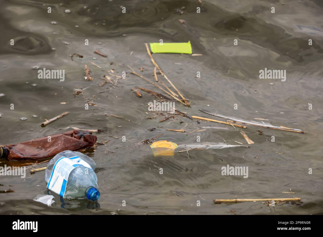 Plastic garbage floating in river. Environment pollution problem Stock ...