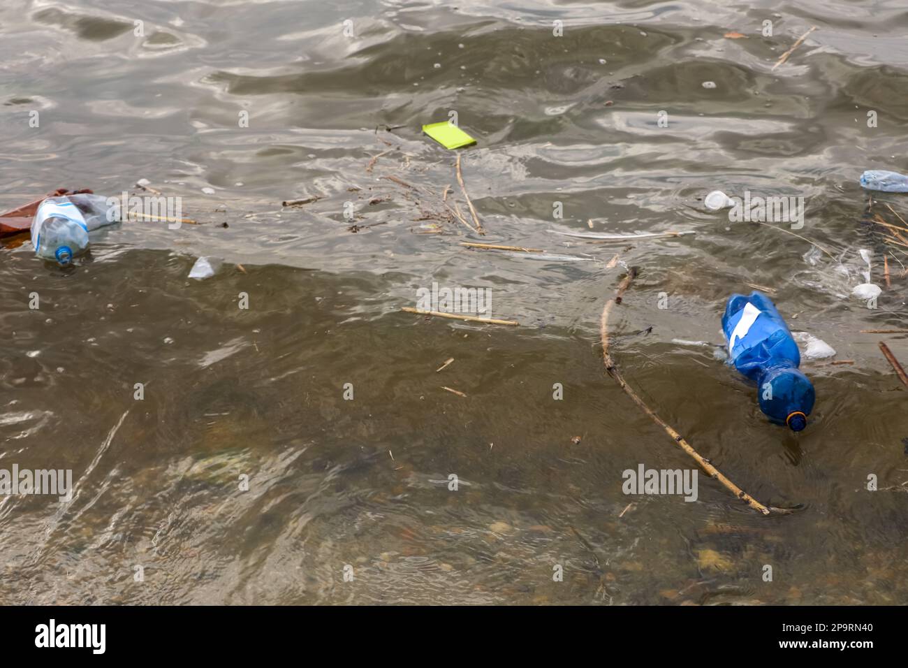 Plastic garbage floating in river. Environment pollution problem Stock ...