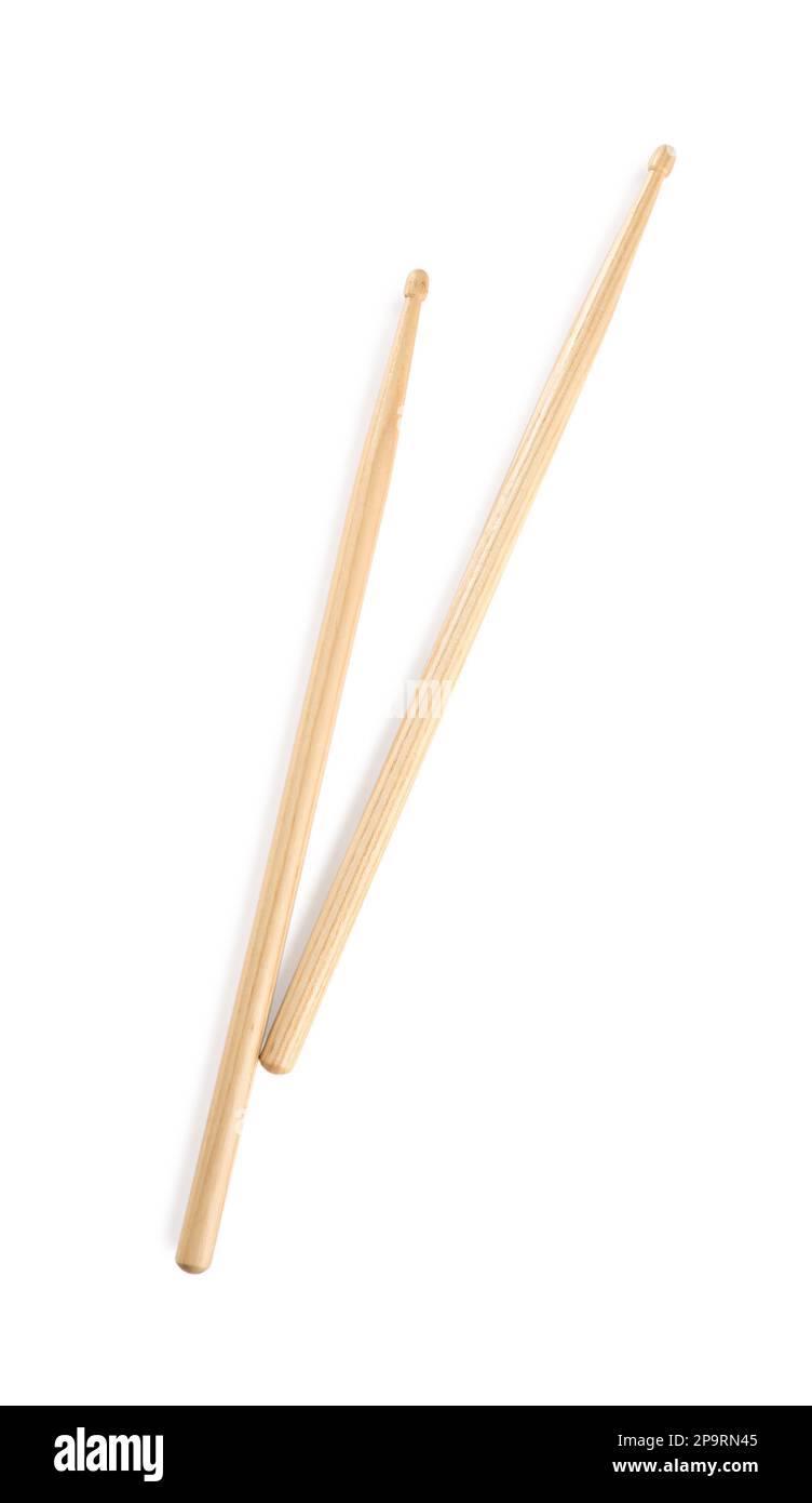 Two wooden drumsticks on white background, top view Stock Photo - Alamy