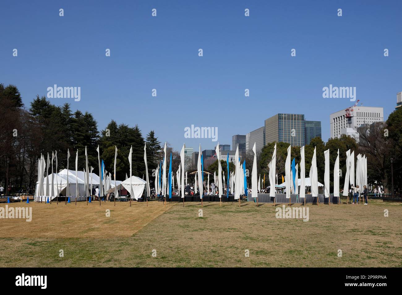 People gather to commemorate the 311 disaster following an earthquake ...