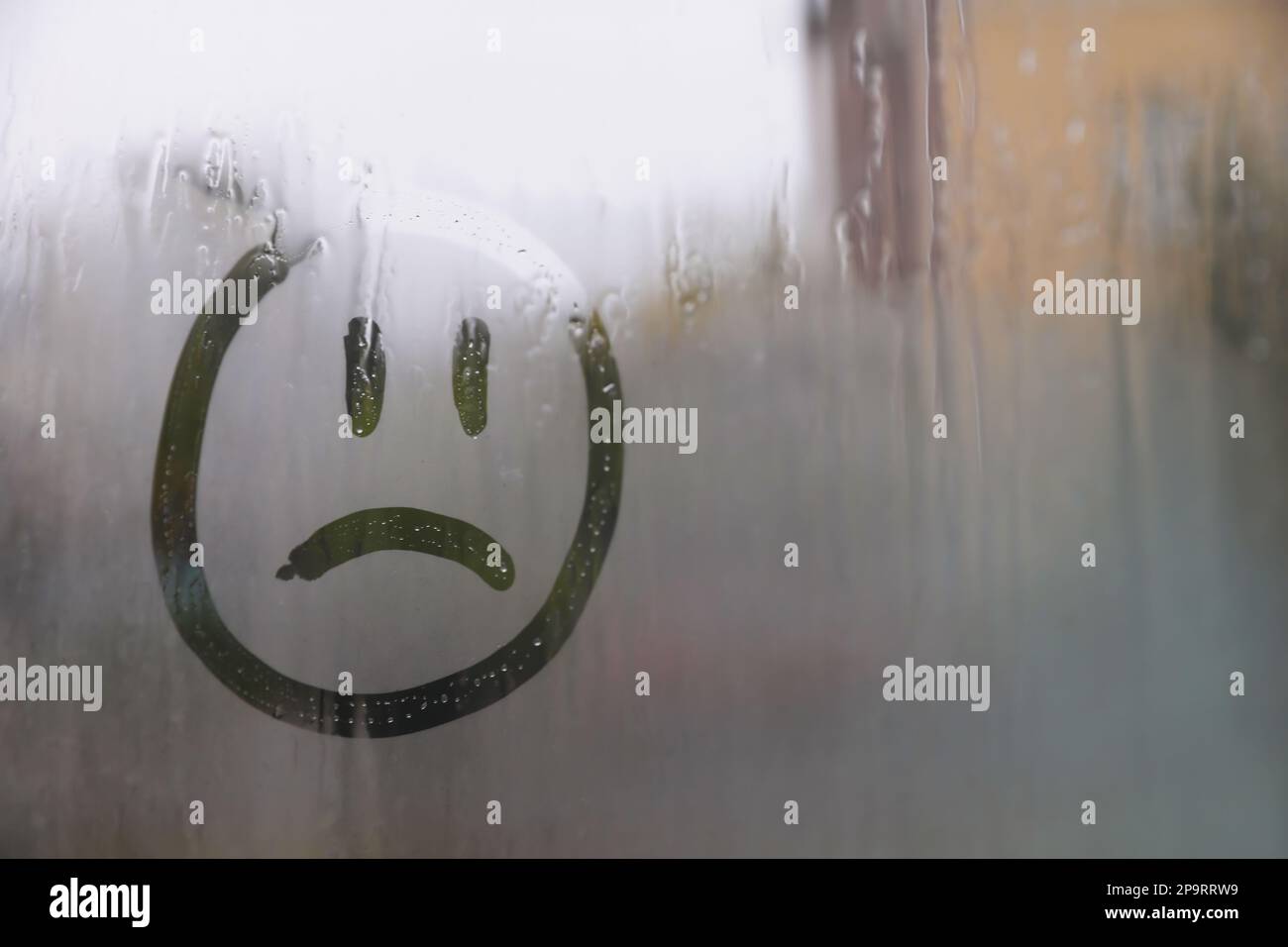 Sad face drawn on foggy window, space for text. Rainy weather Stock ...