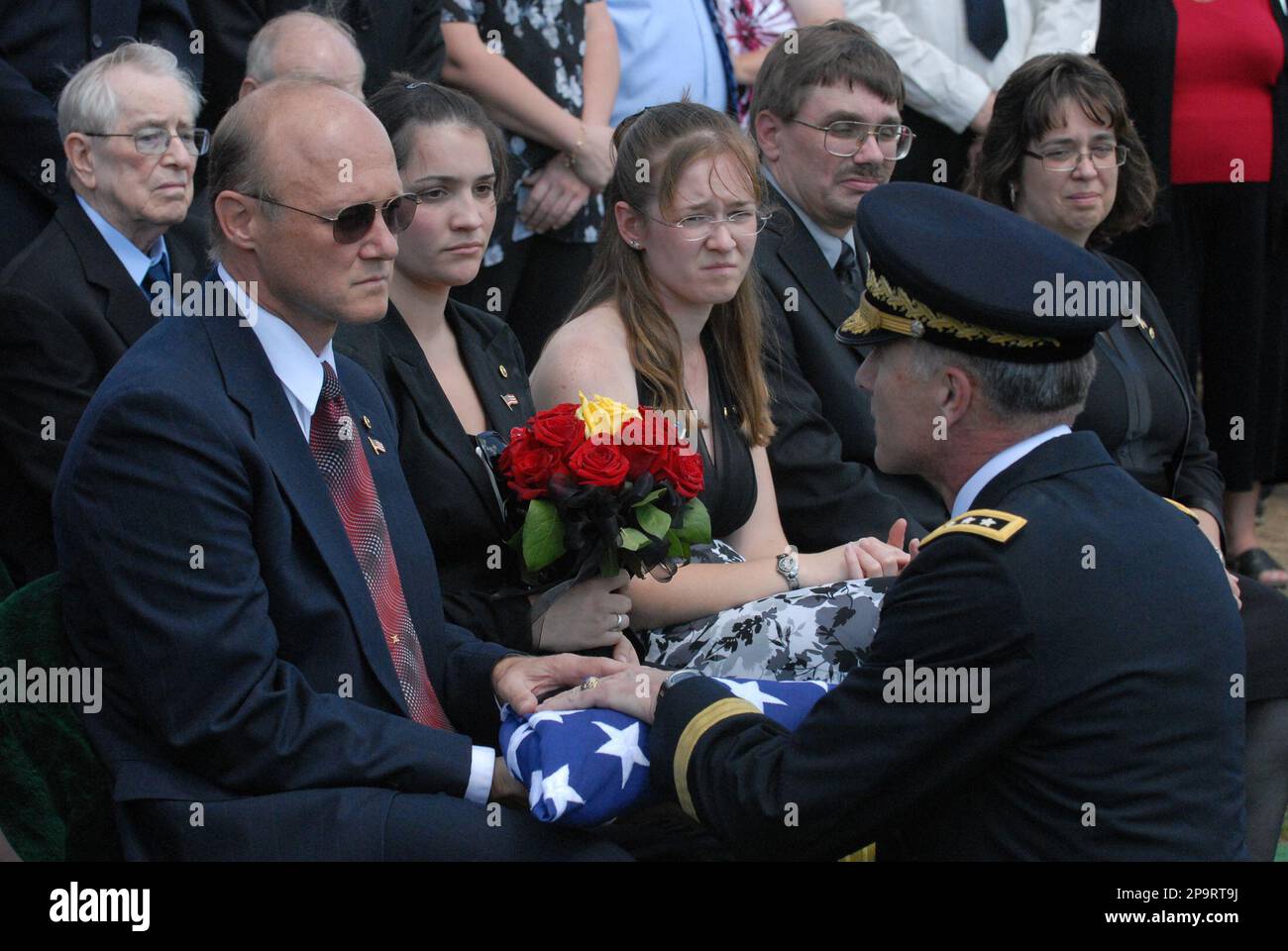 Lt. General David H. Huntoon, Jr. hands Robert Baumann, of ...