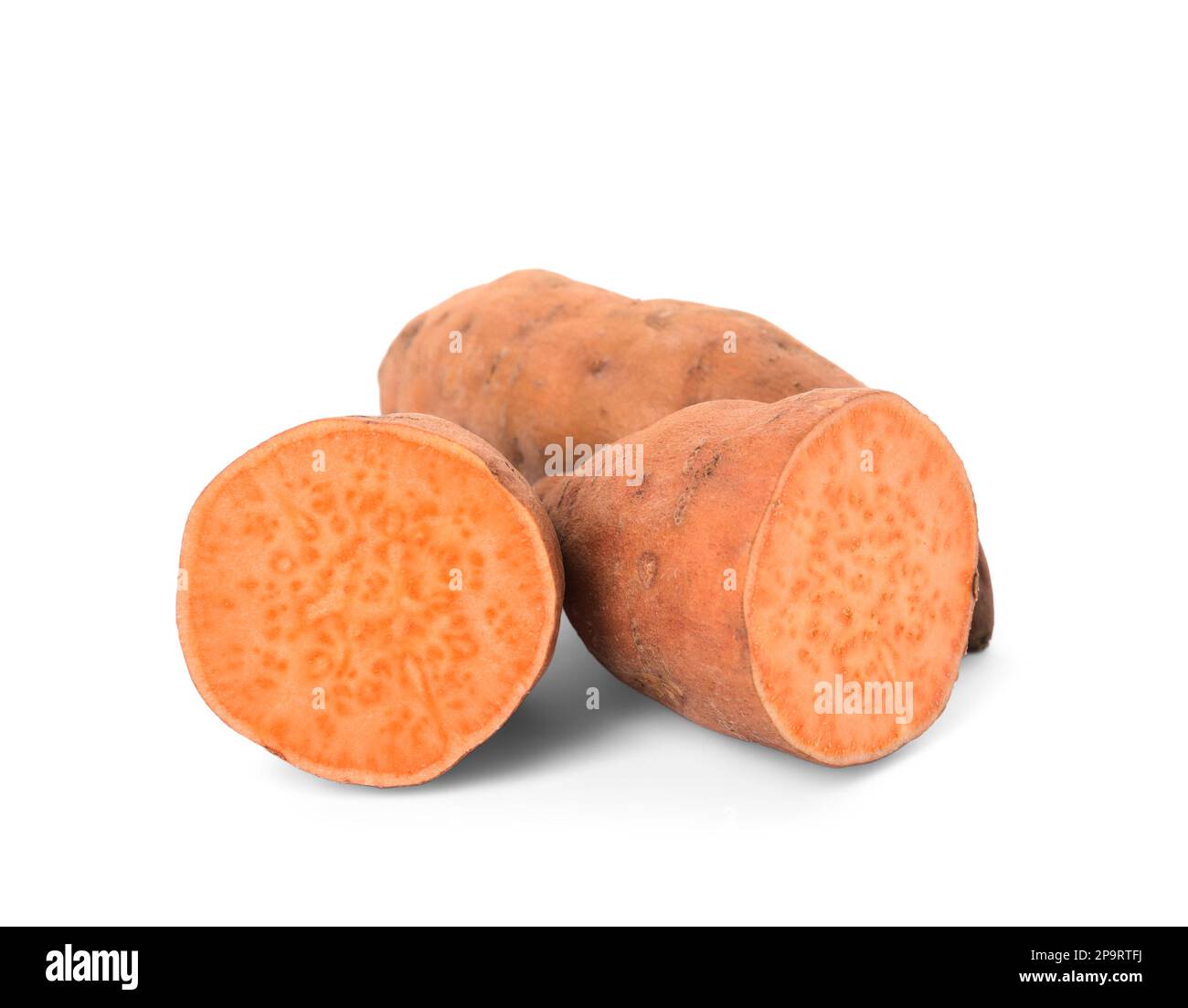 Whole and cut ripe sweet potatoes on white background Stock Photo - Alamy